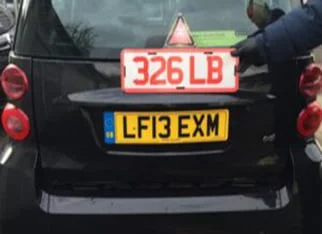 What are trade number plates in the UK? Who can use them?